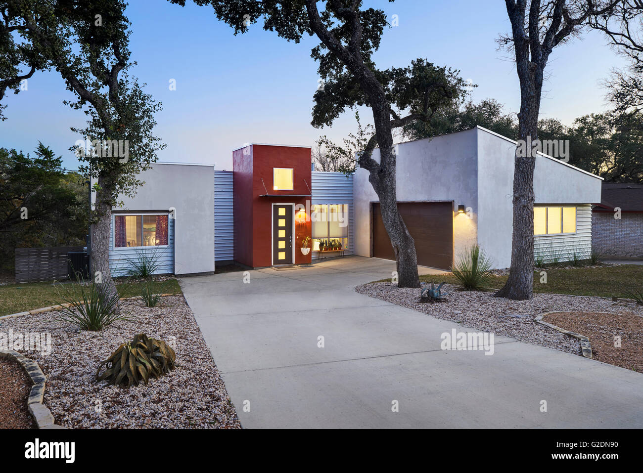 Contemporary Home Exterior at Dusk Stock Photo - Alamy