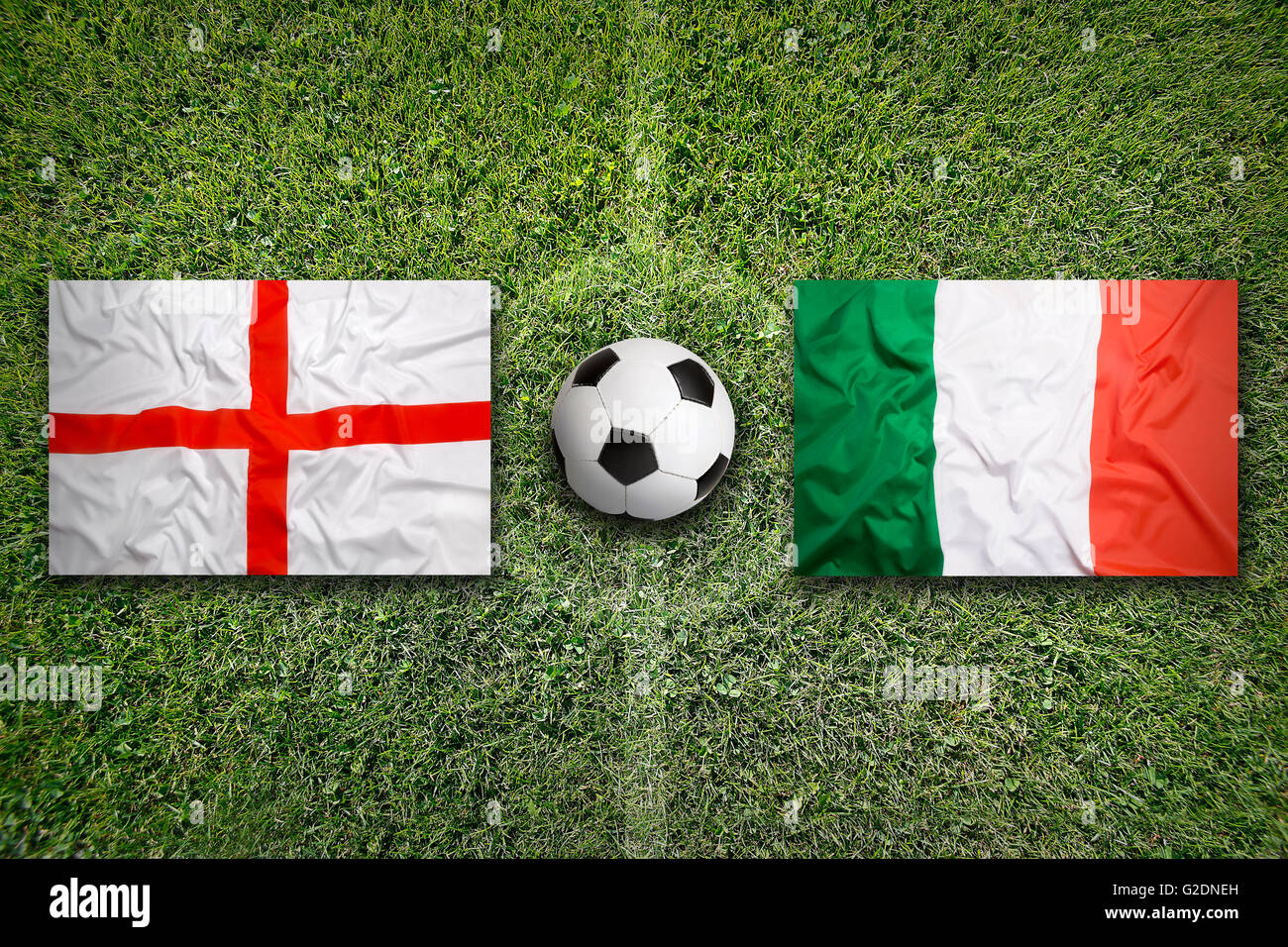 England vs. Italy flags on a green soccer field Stock Photo - Alamy