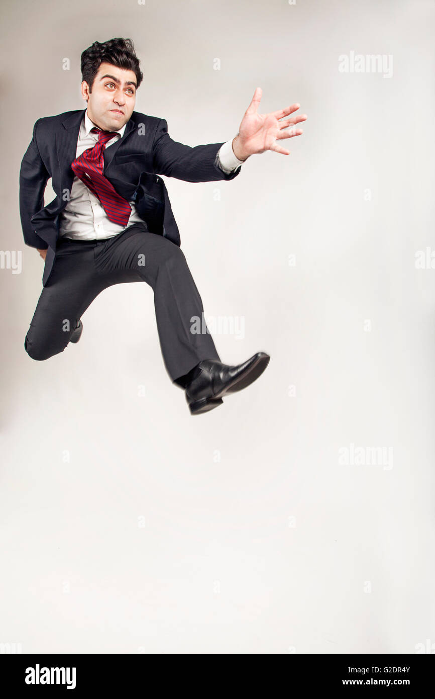 Business Man Jumping Running Forward High Resolution Stock Photography ...
