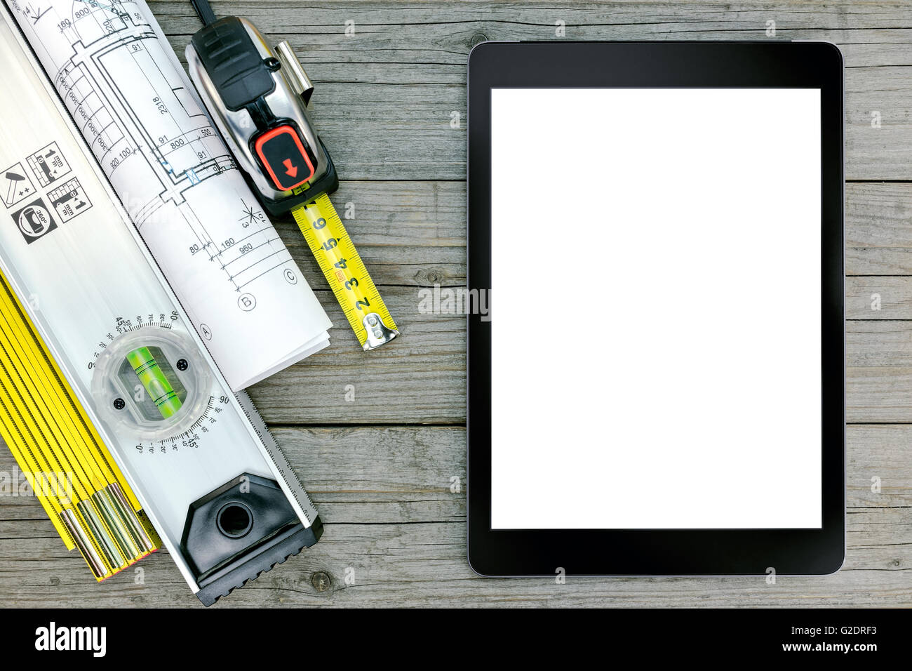 architectural blueprints with contractor work tools with floor plan on ...