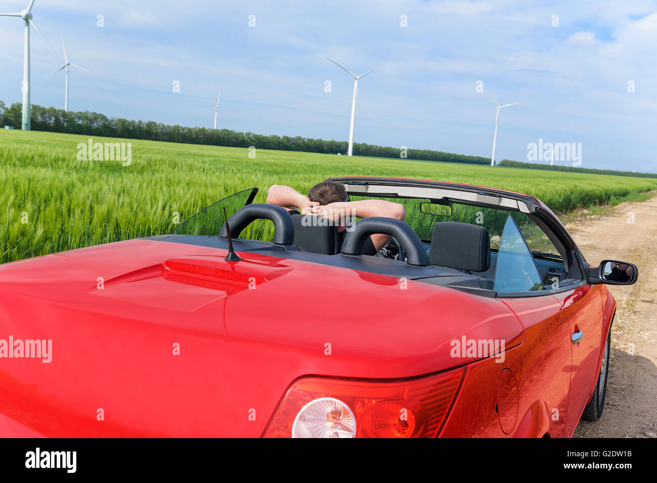 Man in a convertible car hi-res stock photography and images - Alamy