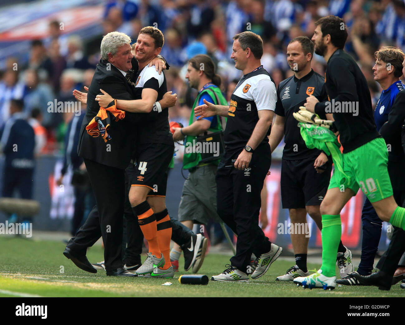 Hull City manager Steve Bruce celebrates with Alex Bruce after the ...