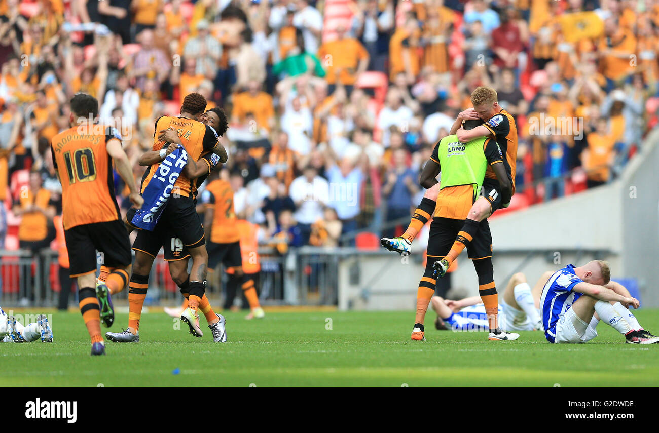 Hull City players celebrate victory at the final whistle and promotion ...