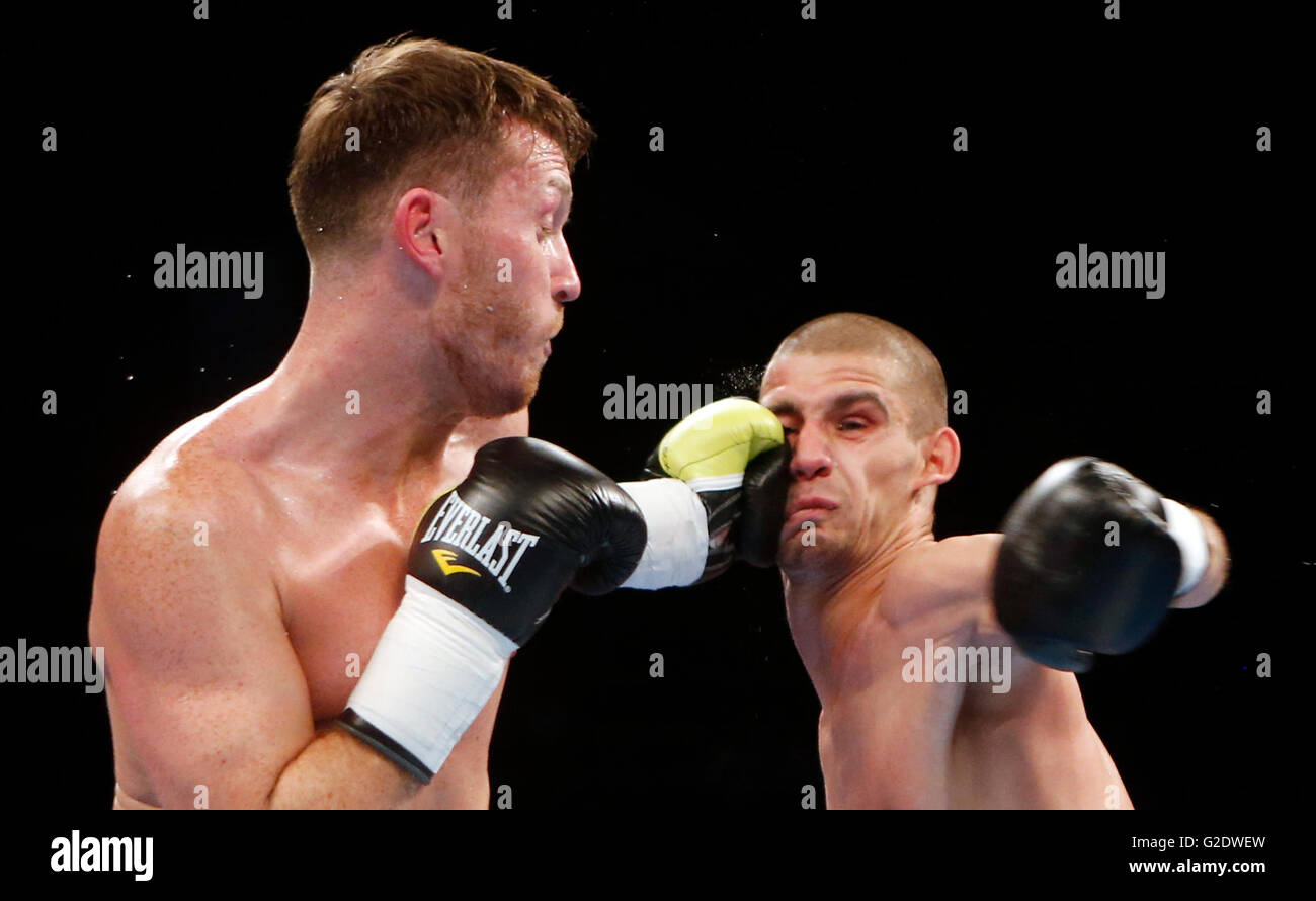 Scott Cardle (left) and Ivan Njegac during their Lightweight contest at ...