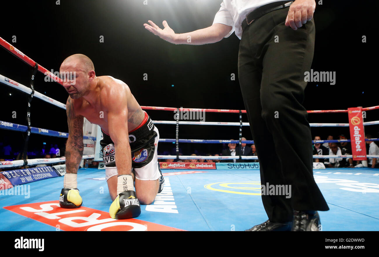 Jon-Lewis Dickinson faces the referees count after being knocked down ...