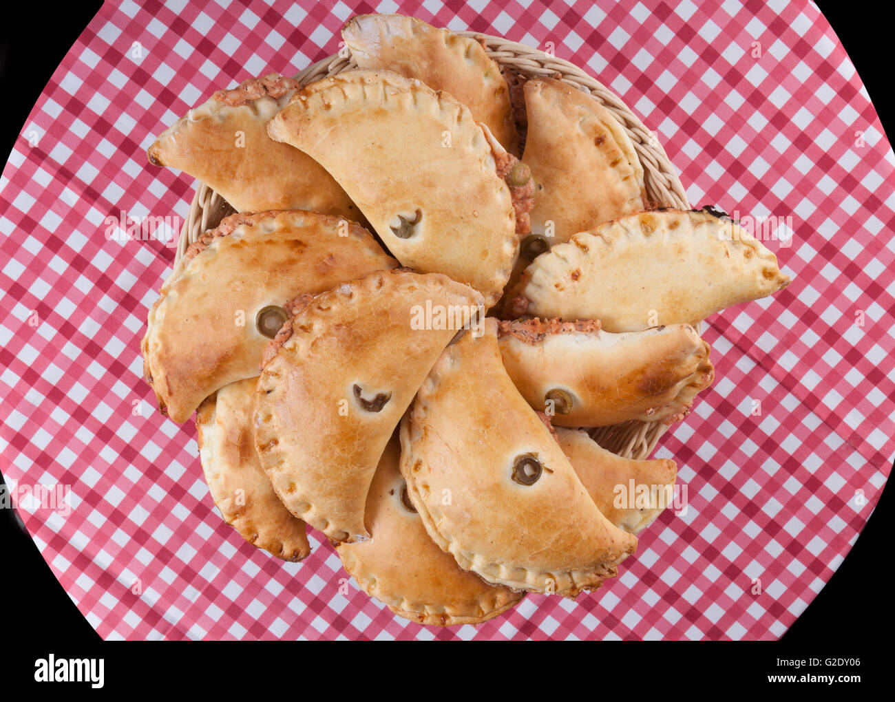 Brown Filled pastry in basket on round table Stock Photo - Alamy