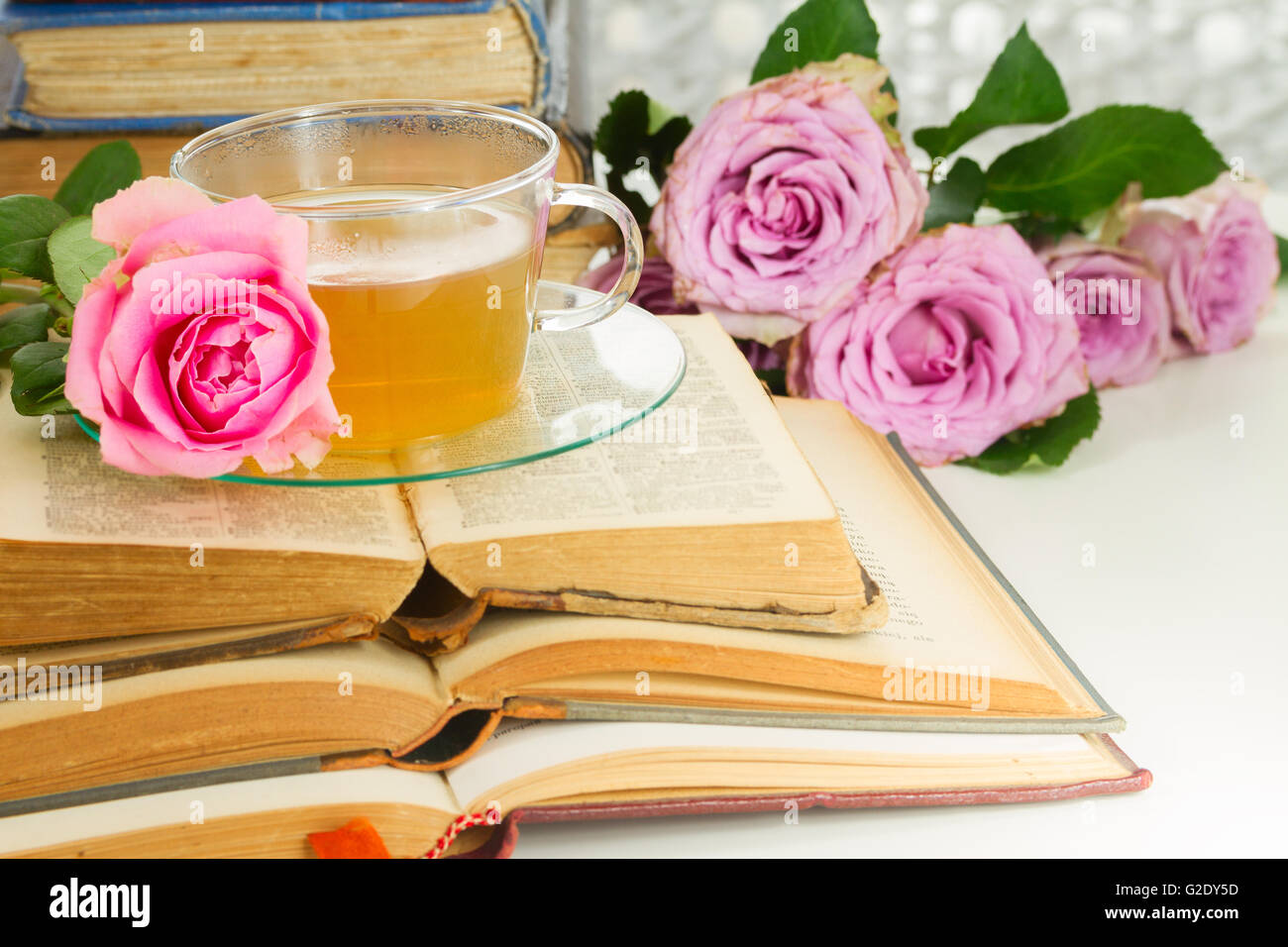 Pile book table teacup hi-res stock photography and images - Alamy