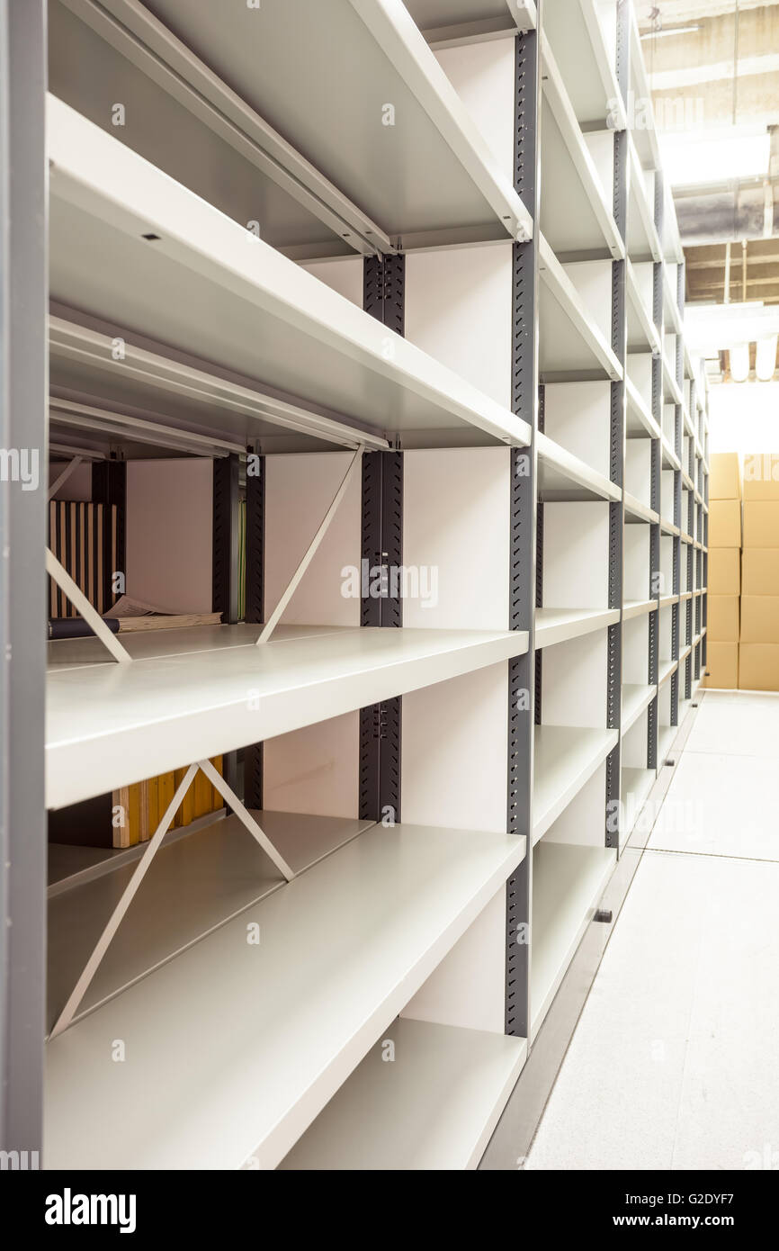 several movable shelves in the basement of the building Stock Photo - Alamy