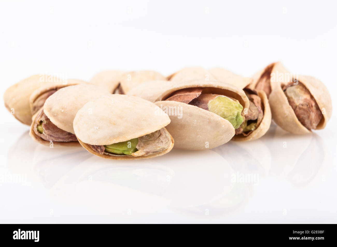 Salted pistacio macro shoot isolated on white background with ...
