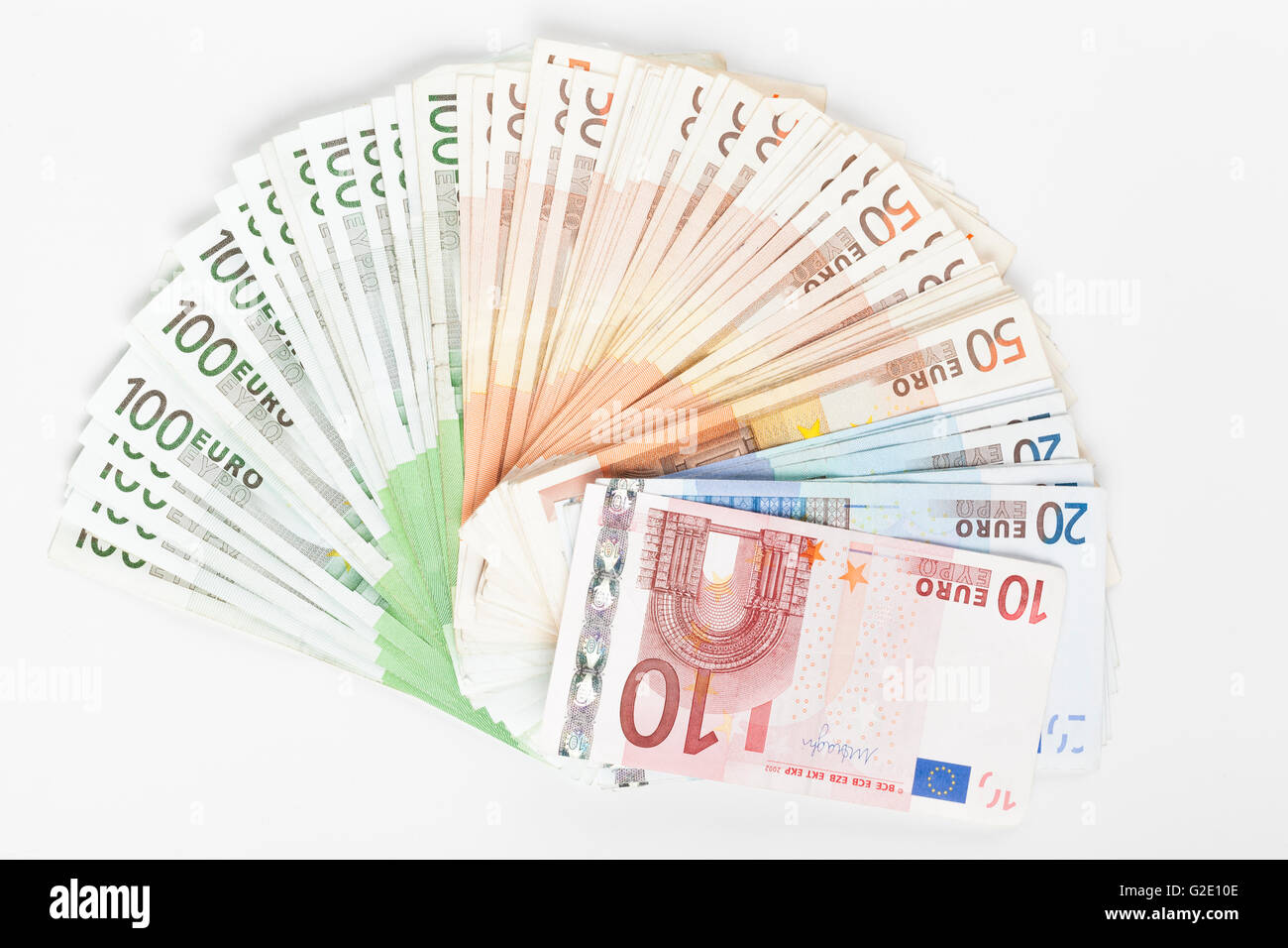 Different euro banknotes on white background Stock Photo - Alamy