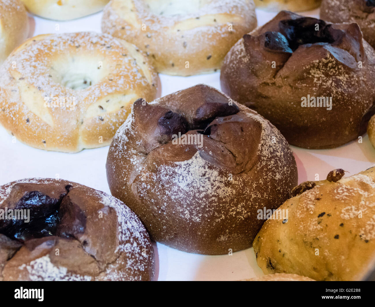 Variety of baked products on a bakery shelf Stock Photo - Alamy