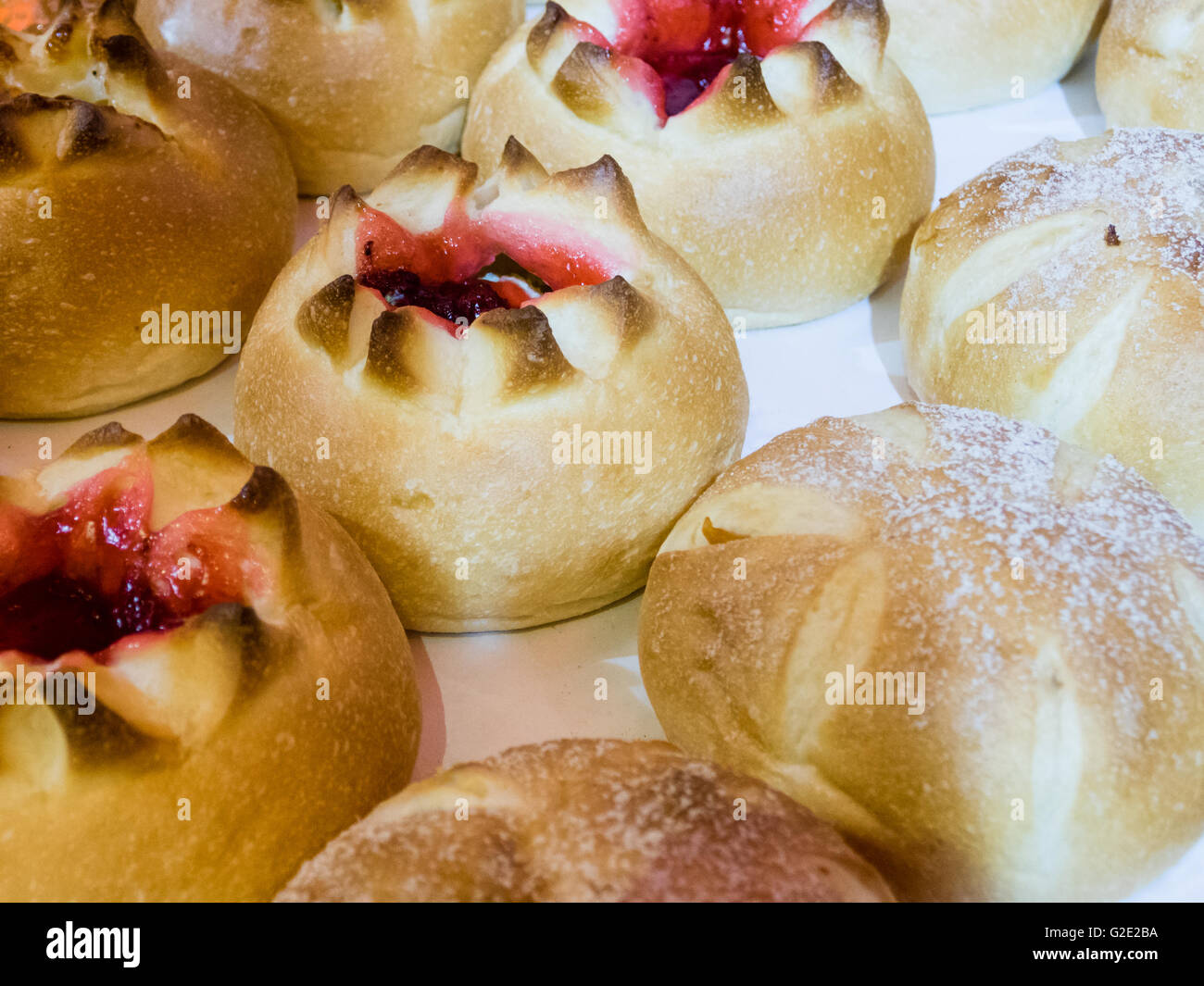 Variety of baked products on a bakery shelf Stock Photo - Alamy