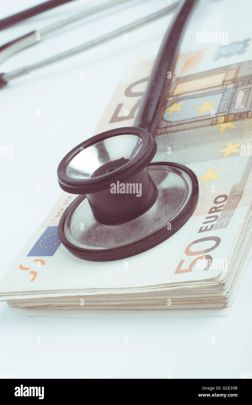 Euro banknote pile with black stethoscope inked style image Stock Photo ...