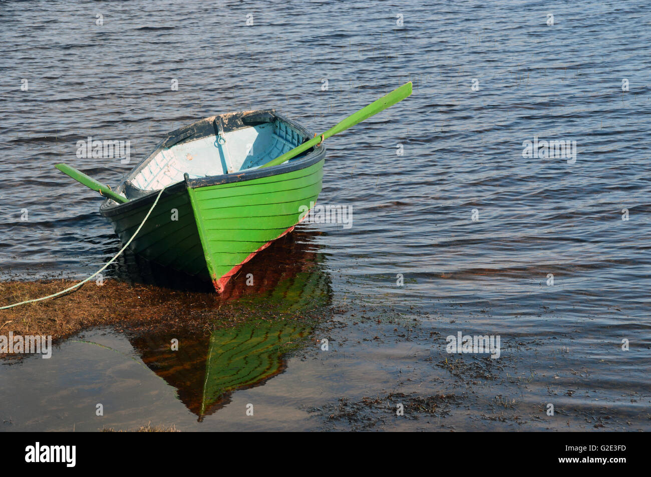 Green Rowing Boat Reflected in Loch Surstabhat on North Harris, Outer ...