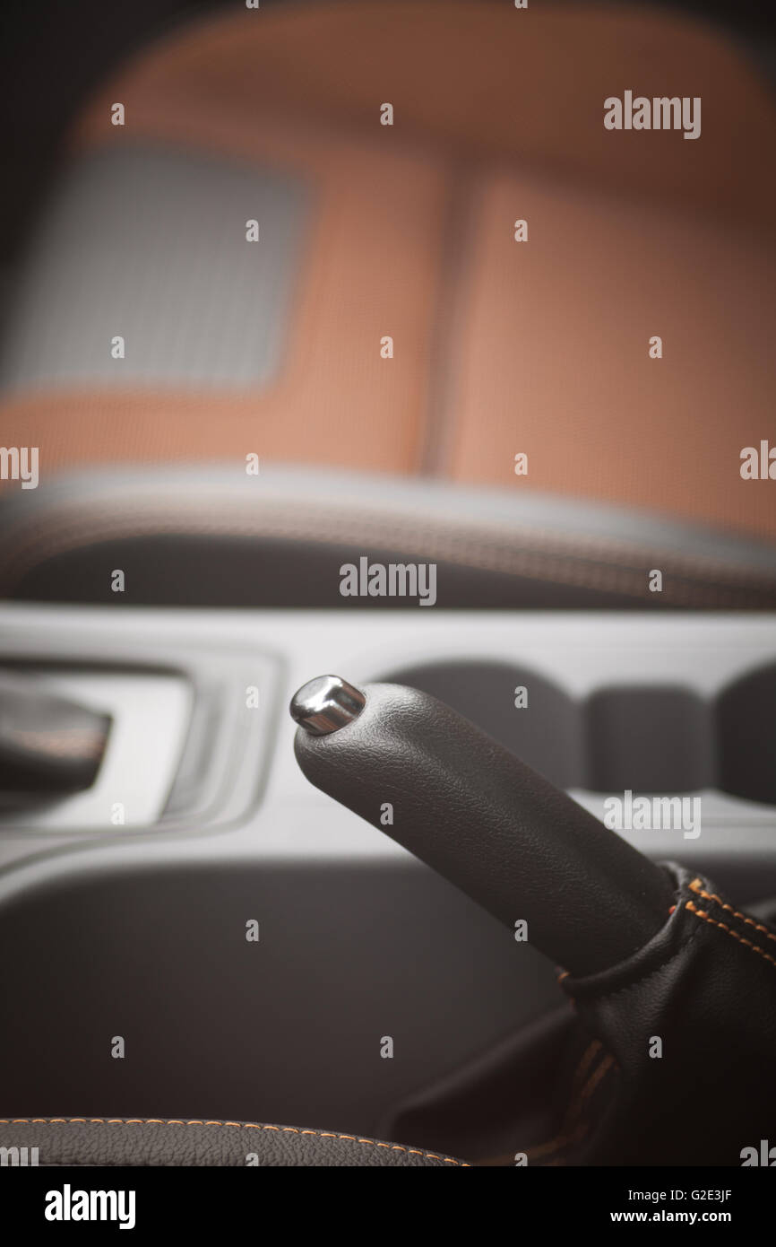 Close up shot of the hand brake of a car Stock Photo - Alamy