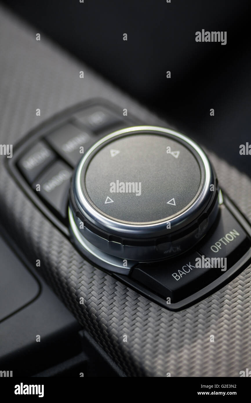 Detail of some black buttons in a car Stock Photo - Alamy