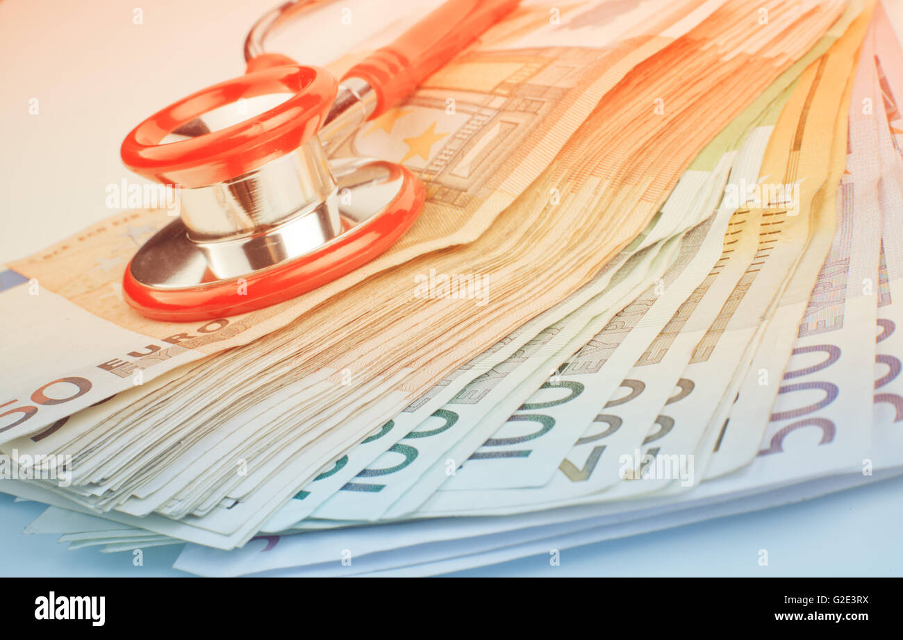 Euro banknote pile with red stethoscope inked style image Stock Photo ...