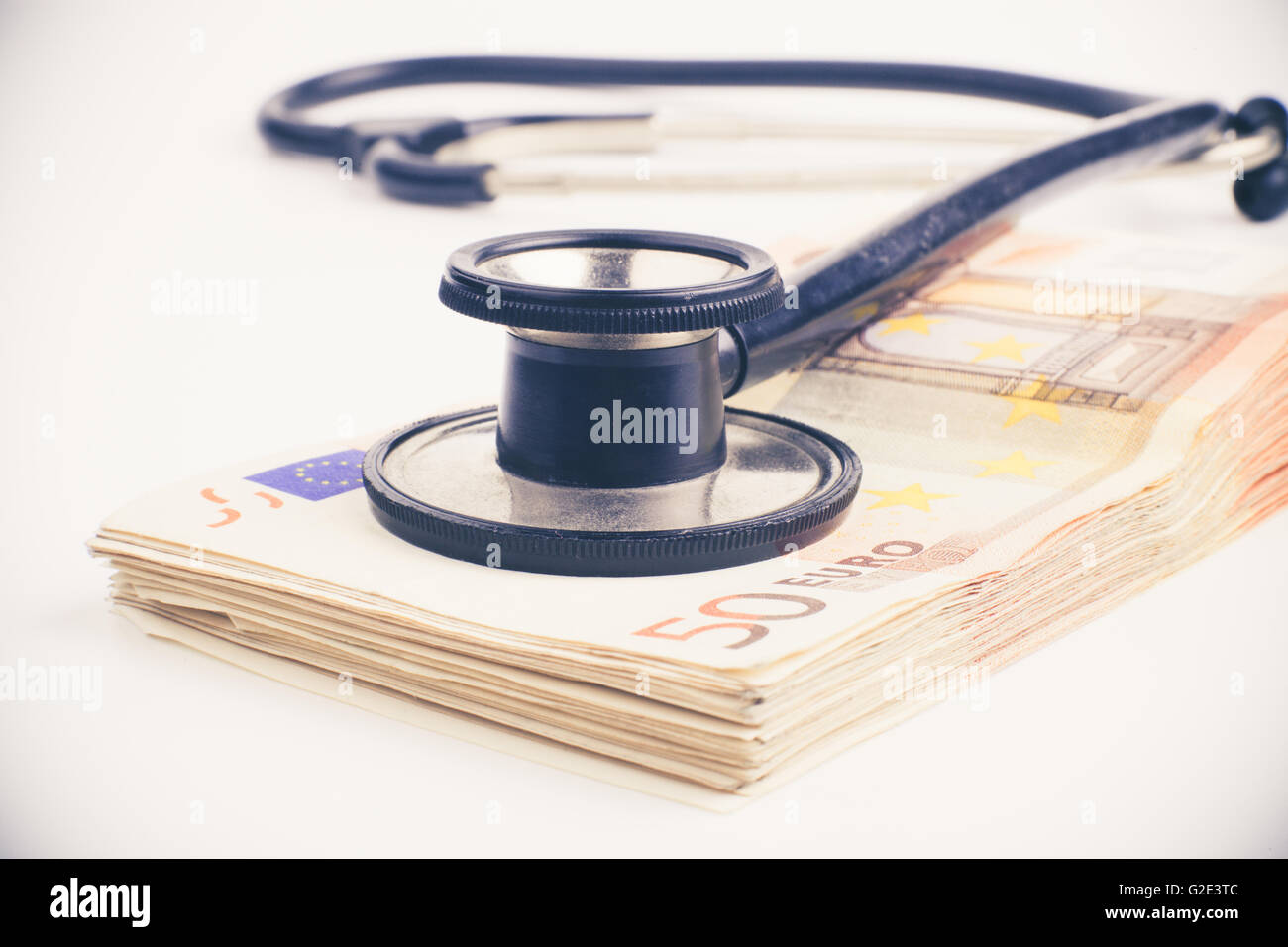 Euro banknote pile with black stethoscope inked style image Stock Photo ...
