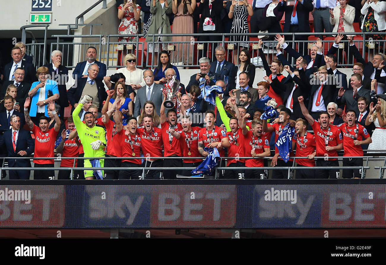 Barnsley players celebrate with the trophy after winning the Sky Bet ...