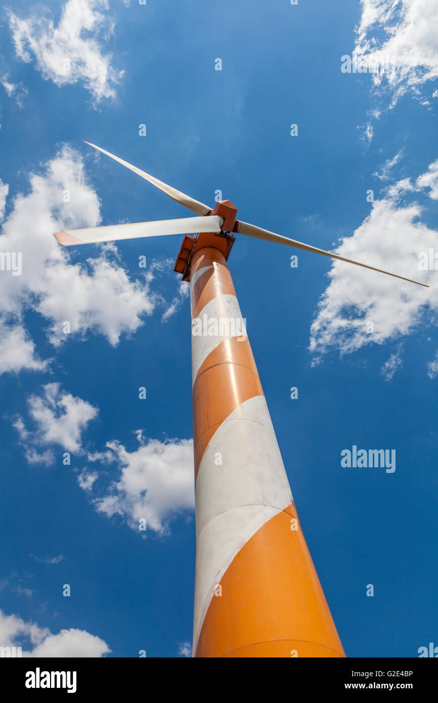 Orange windmill on blue sky background with white clouds Stock Photo ...