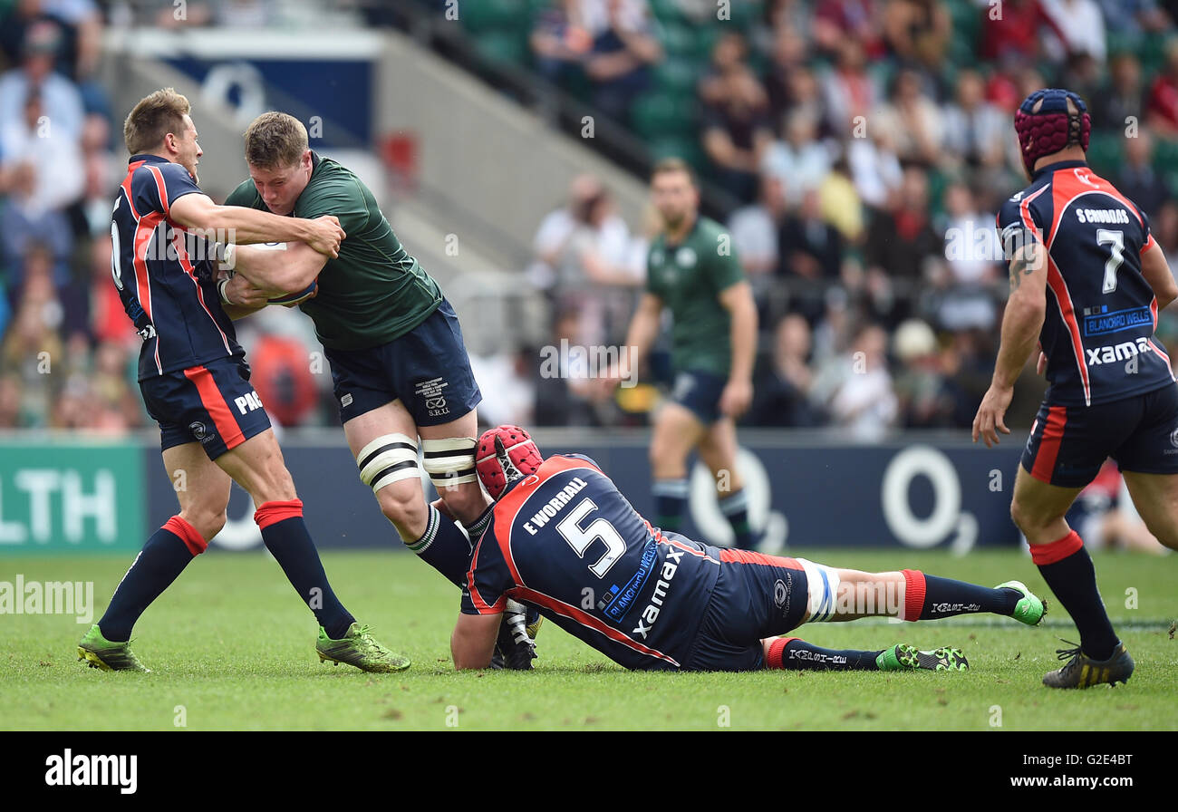 Staffordshire's Joe Gazzard is tackled by Hampshire's Pierre-Alex Clark ...