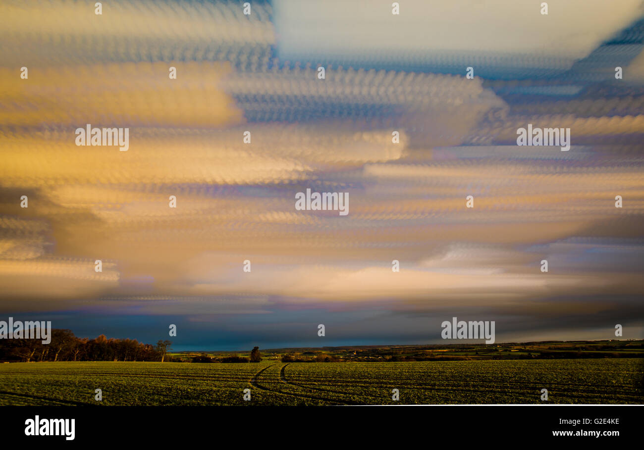 timelapse movement of clouds with long reaching scenic landscape Stock ...