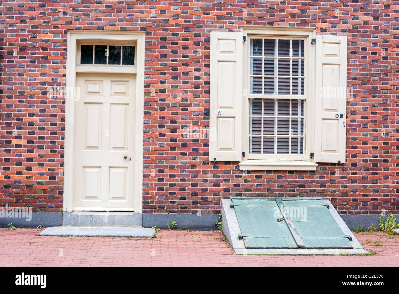 Classic door and window of a brick building Stock Photo - Alamy