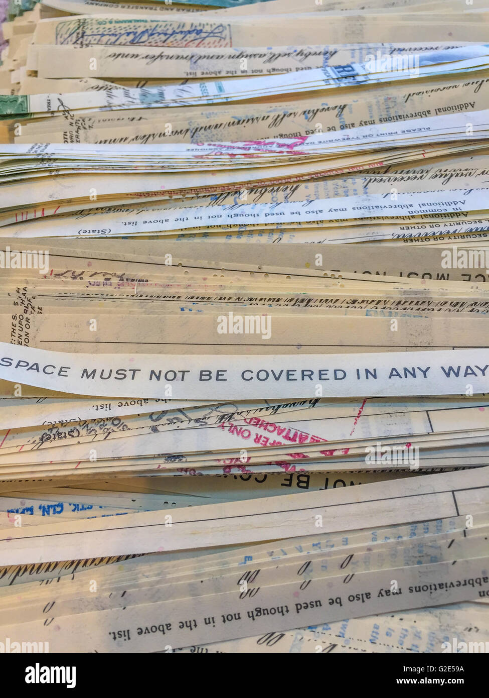 strips of old obsolete stock certificates with words Stock Photo - Alamy