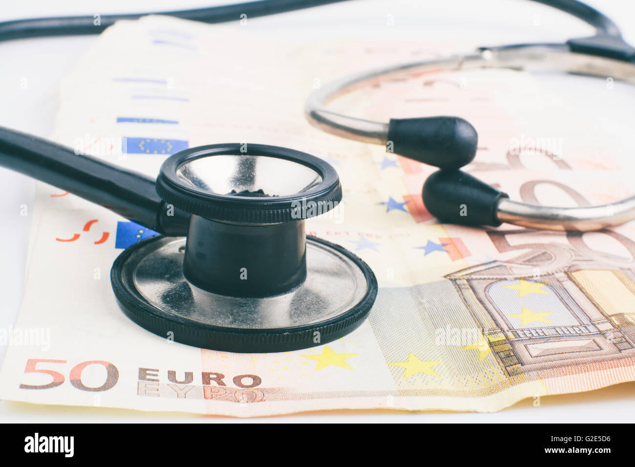 Euro banknote pile with Black stethoscope inked style image Stock Photo ...
