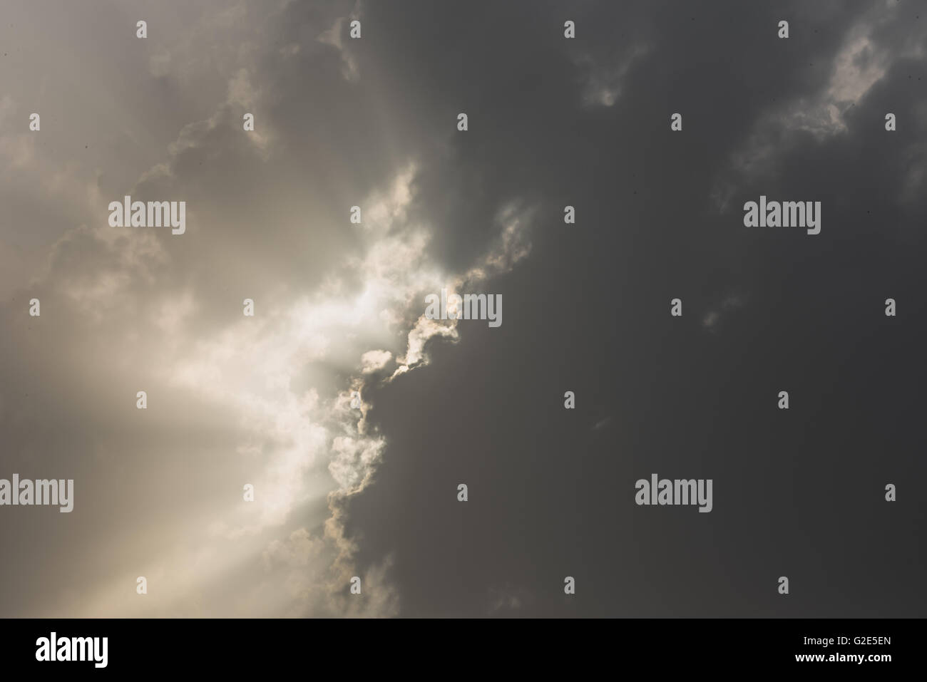 Cloud burst during sun rise Stock Photo - Alamy