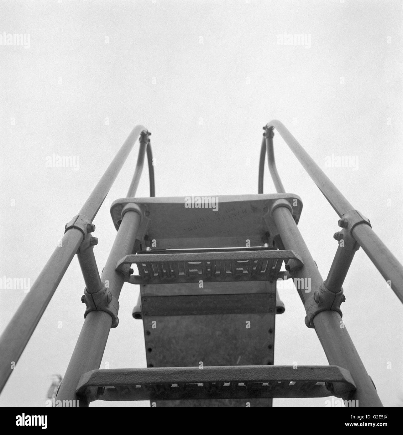 Playground slide ladder climb Black and White Stock Photos & Images - Alamy