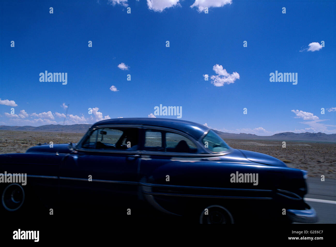 Vintage Car on Highway Stock Photo - Alamy