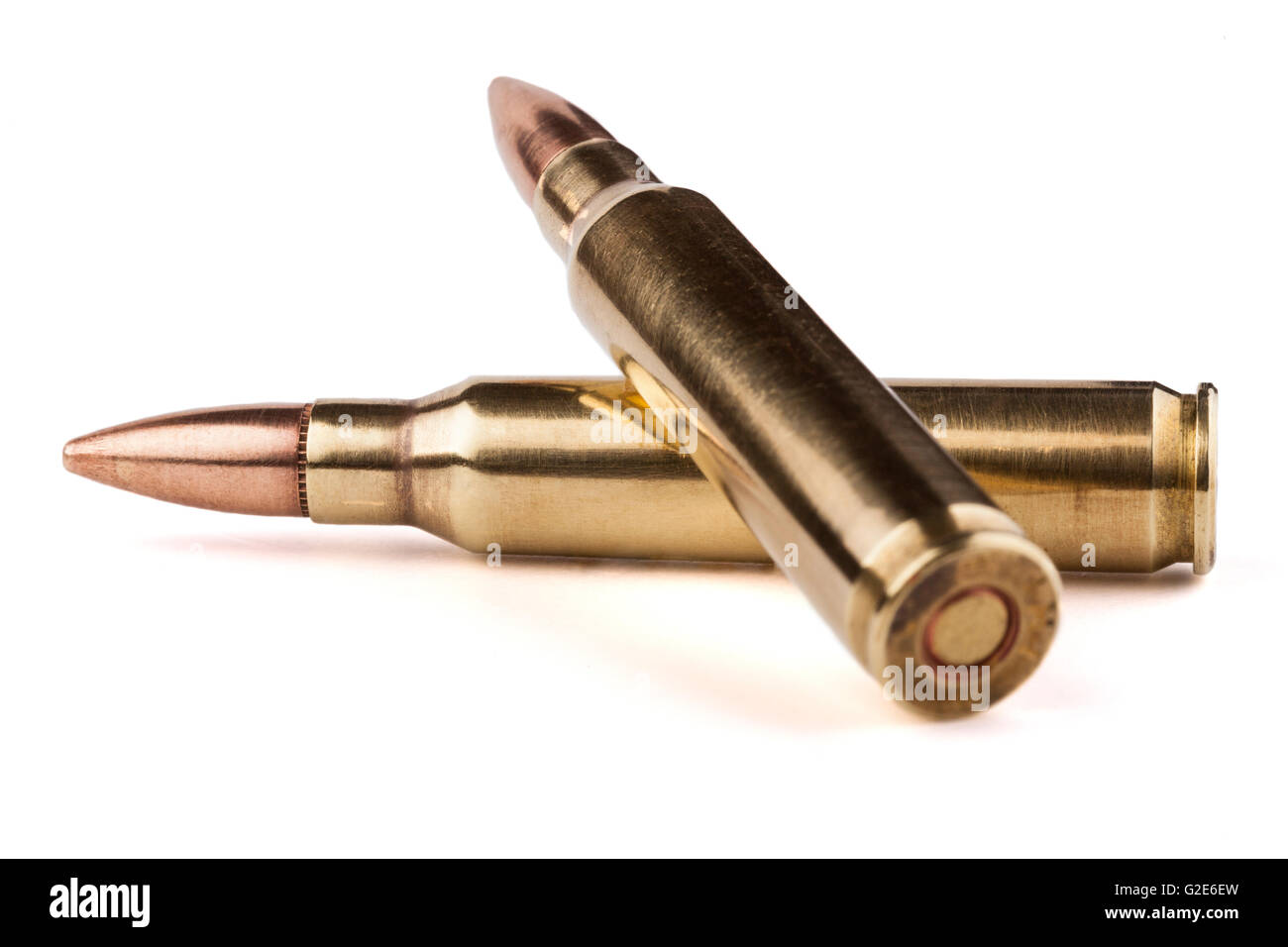 Two rifle bullets isolated on white background Stock Photo - Alamy