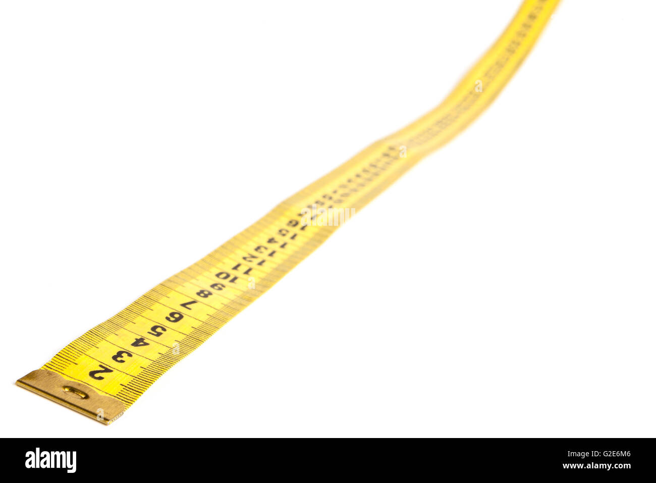 Long Yellow measuring tape close-up isolated on white background Stock ...
