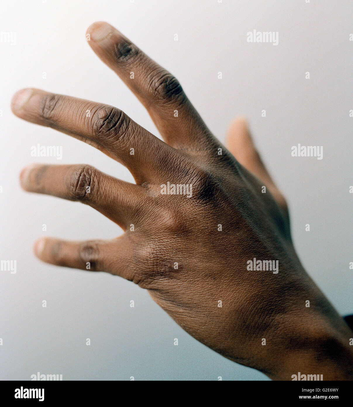 Reaching Out Hand Stock Photo - Alamy