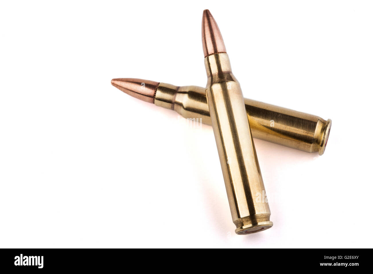 Two rifle bullets isolated on white background Stock Photo - Alamy