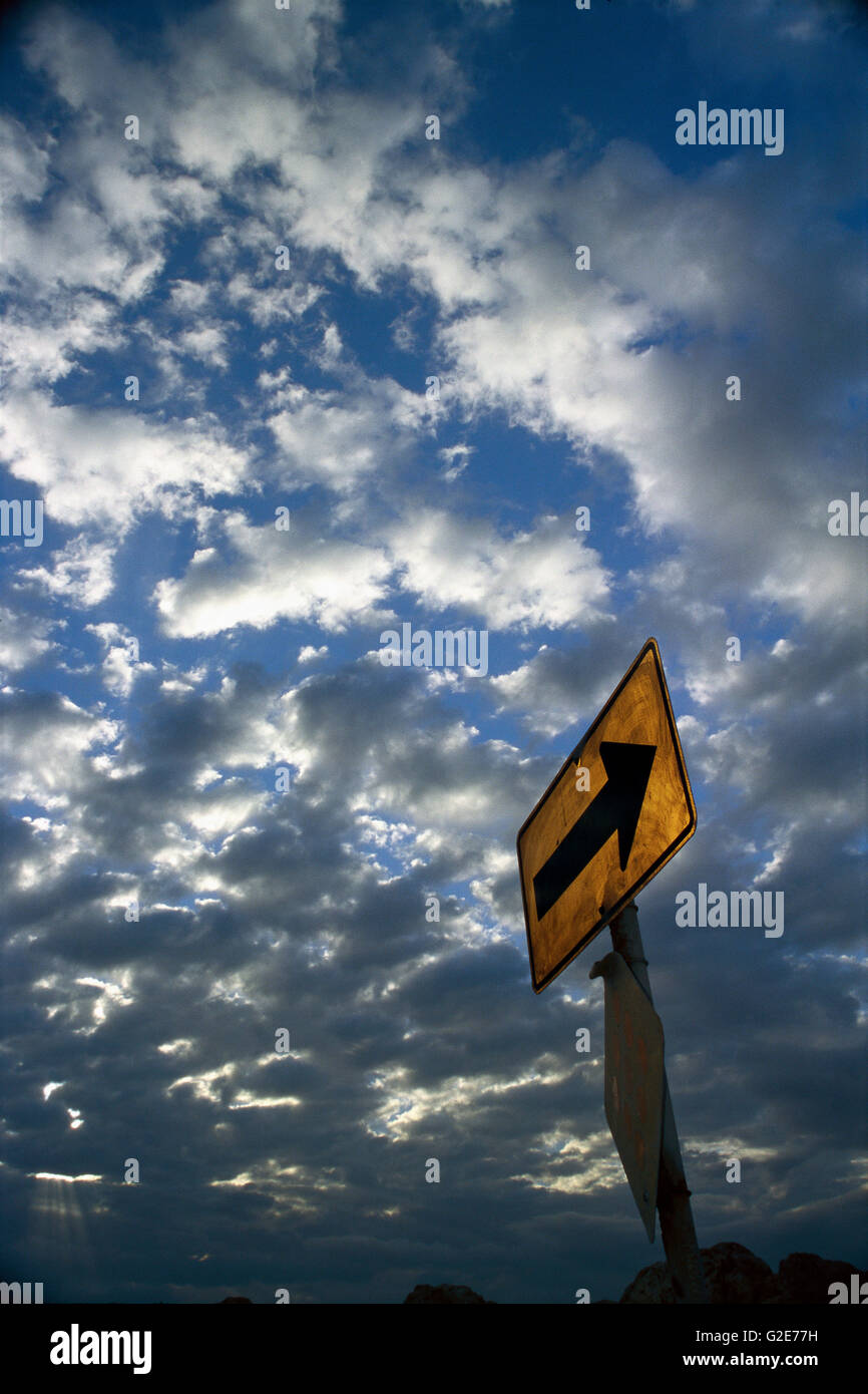 Arrow Sign Against Dramatic Sky Stock Photo - Alamy