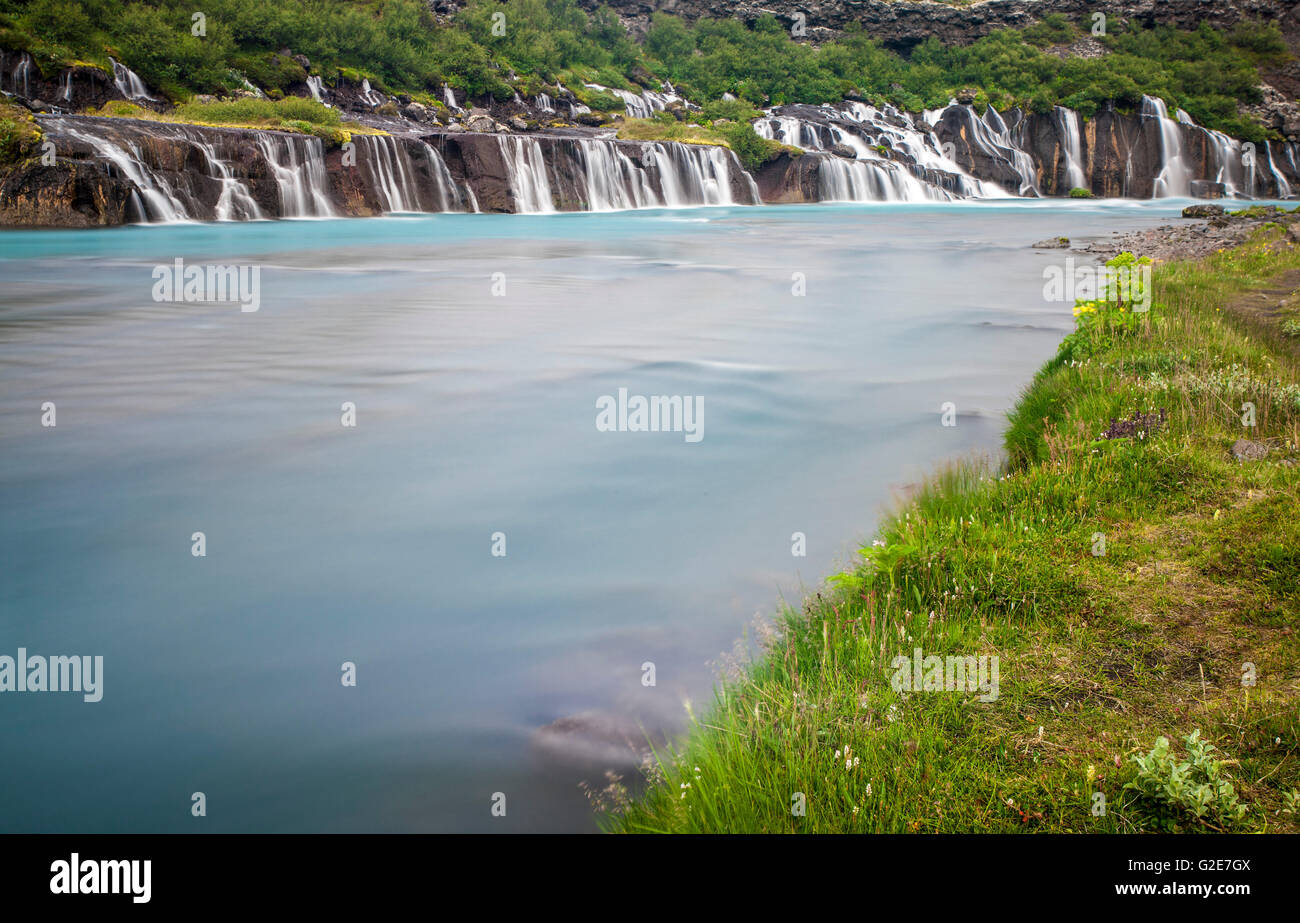 Waterfalls Flowing from Lava Rocks into River, Iceland Stock Photo - Alamy