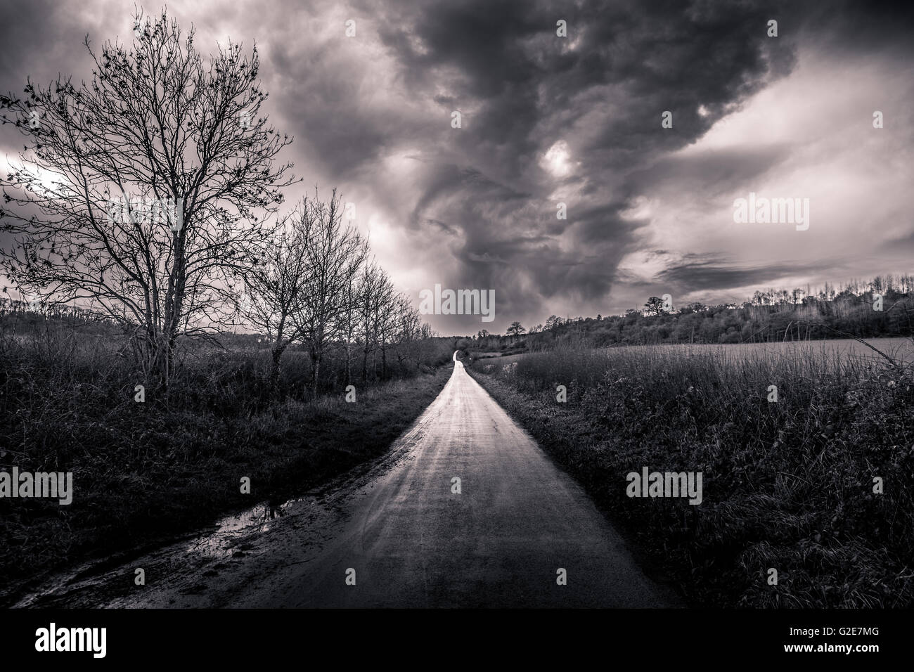 Rural Road with Dramatic Sky Stock Photo - Alamy