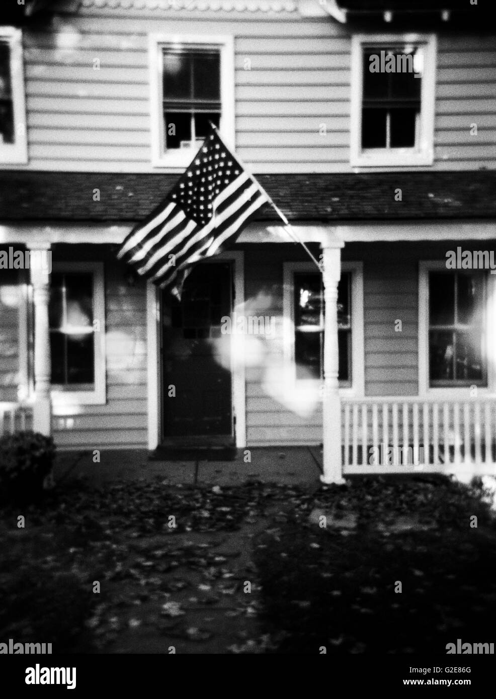 American flag on home Black and White Stock Photos & Images - Alamy