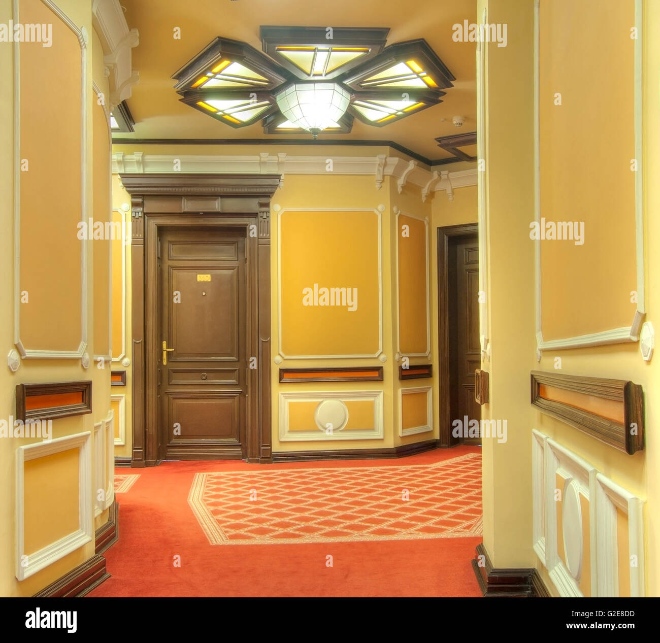 Converging Hallways in Hotel Stock Photo - Alamy