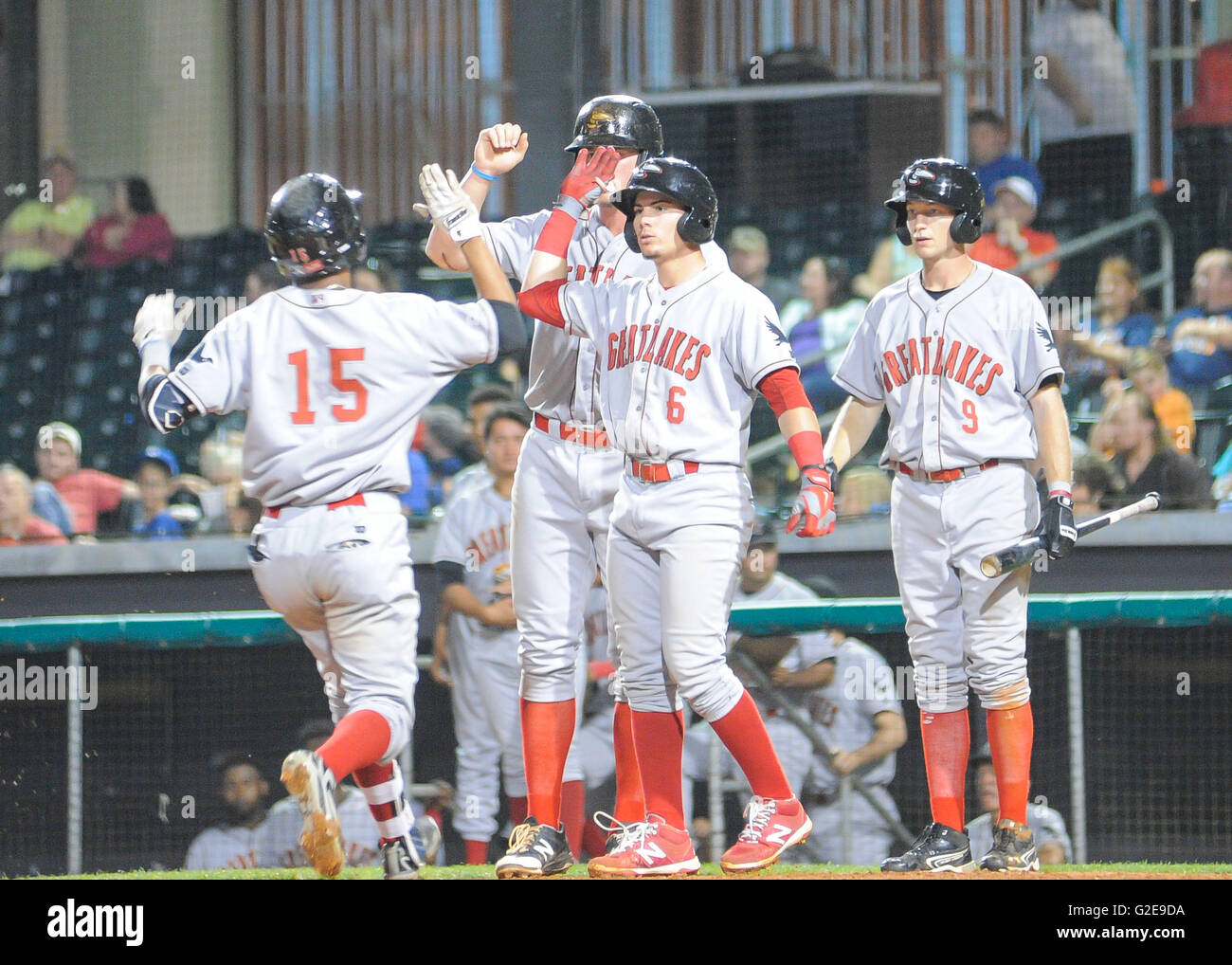May 28, 2016 Great Lakes Loons left fielder Ariel Sandoval (15) is met ...