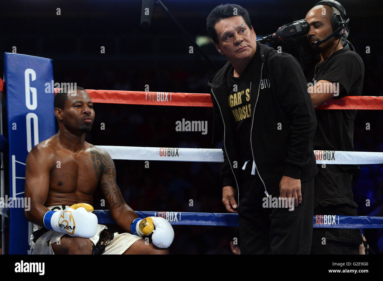 May 28, 2016; Shane Mosley (left) and trainer Roberto Duran look on in ...
