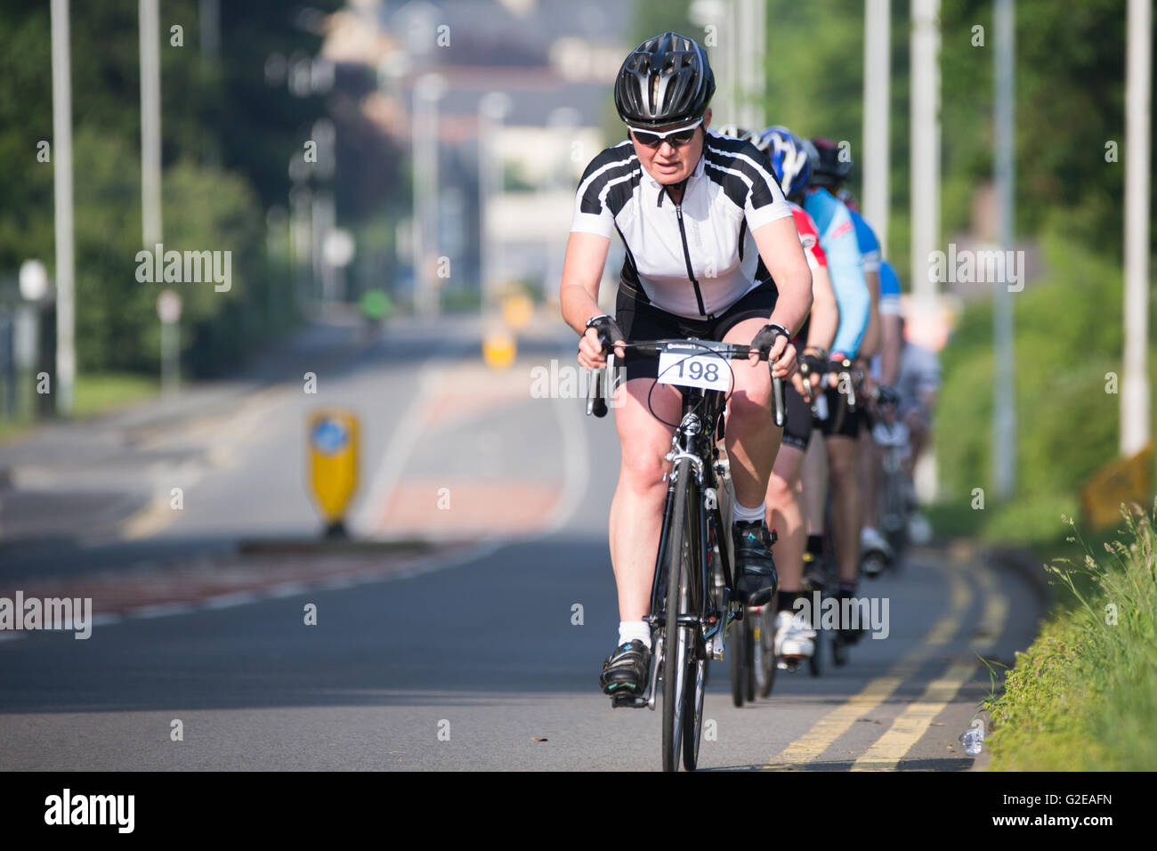 Cycling up a hill hi-res stock photography and images - Alamy