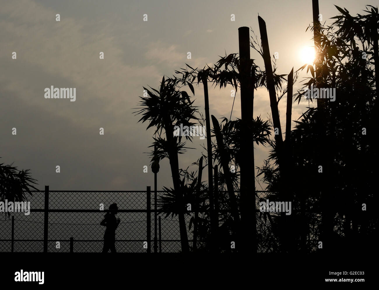 Chengdu, China's Sichuan Province. 28th May, 2016. A citizen runs at ...