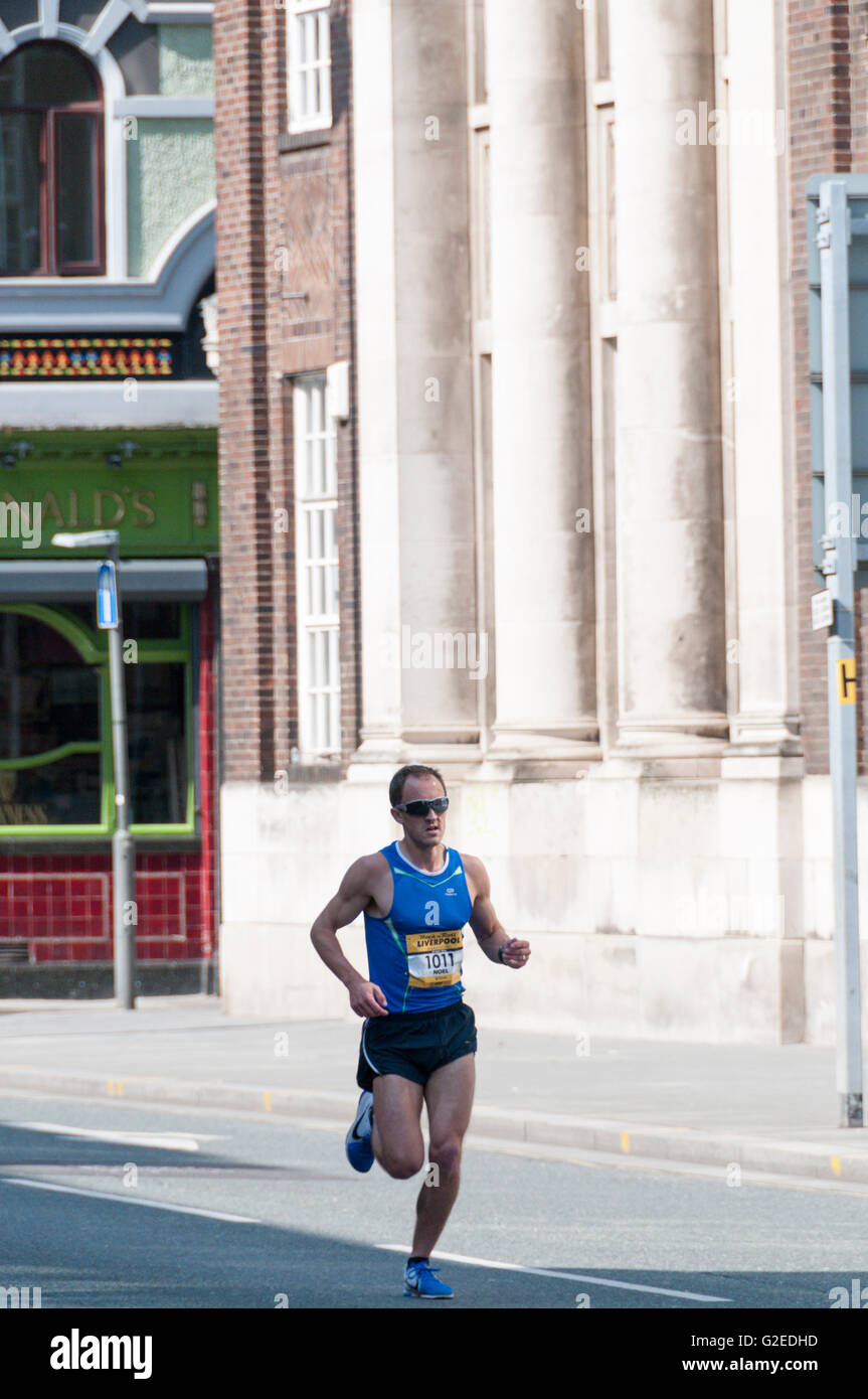 Liverpool, UK. 29 May 2016. A front runner in the full marathon event ...