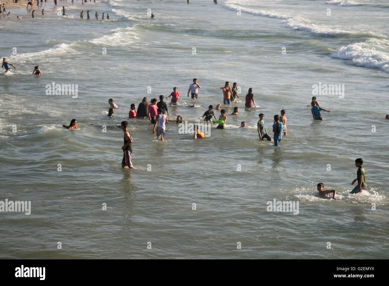 Palestinian Territories - Palestinians swim in the Mediterranean Sea at ...