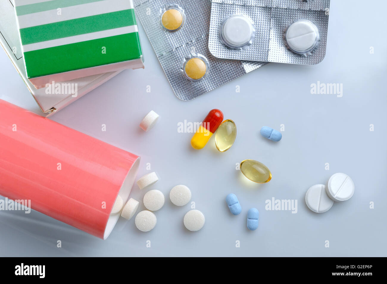 glass table with tablets group, blisters and containers. Top view Stock ...