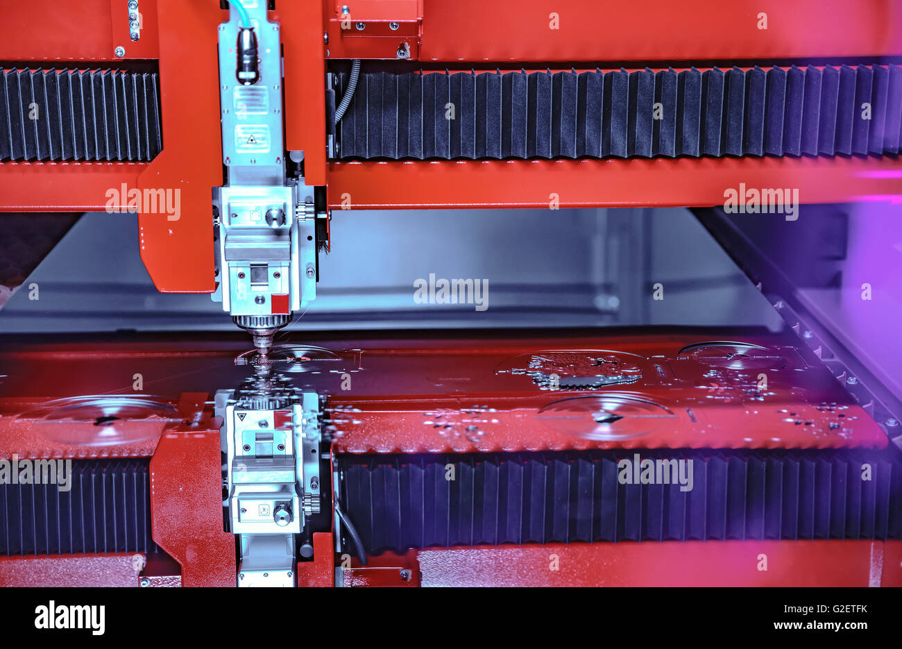 CNC Laser cutting of metal, modern industrial technology. Small depth ...