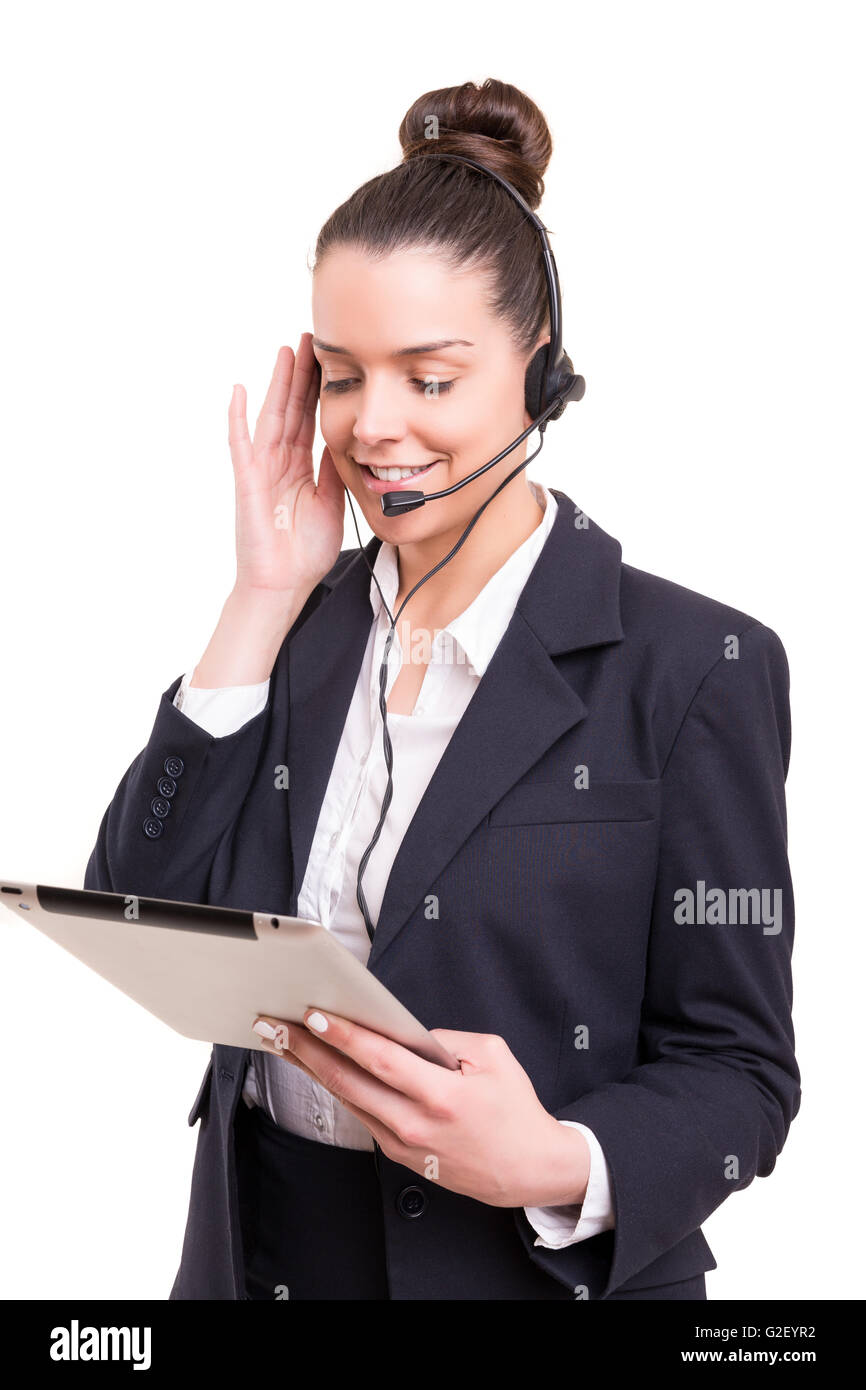 A friendly telephone operator smiling isolated over a white background ...
